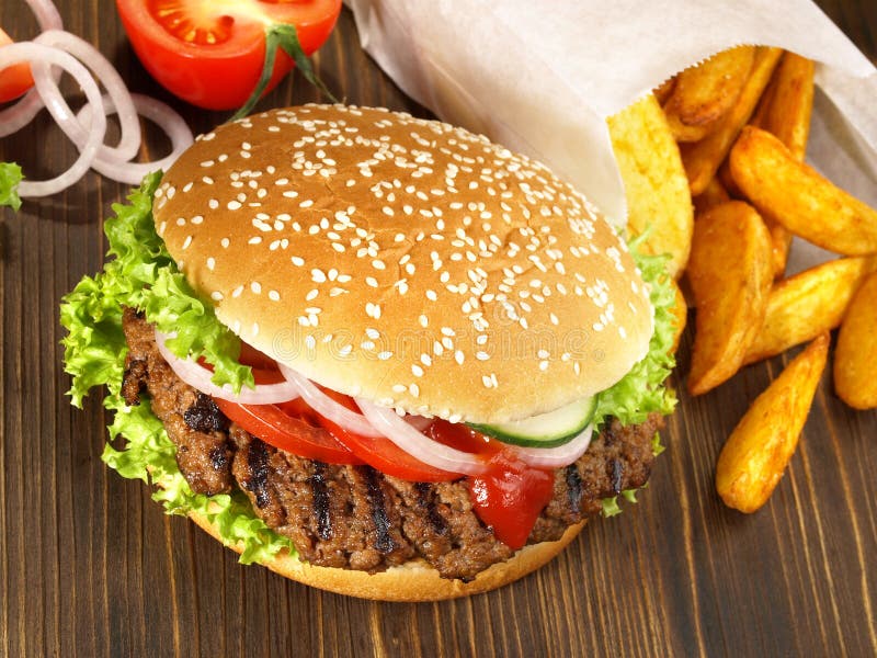 Big Size Hamburger with Potato Wedges - Fast Food Stock Photo - Image ...