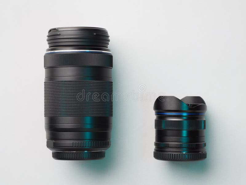 Big and small camera lens. stock photo. Image of difference - 210463360