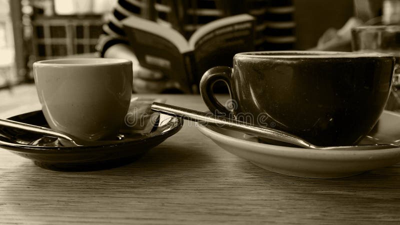 Big and Small Cup of Coffee with Book Lover Stock Photo - Image of ...