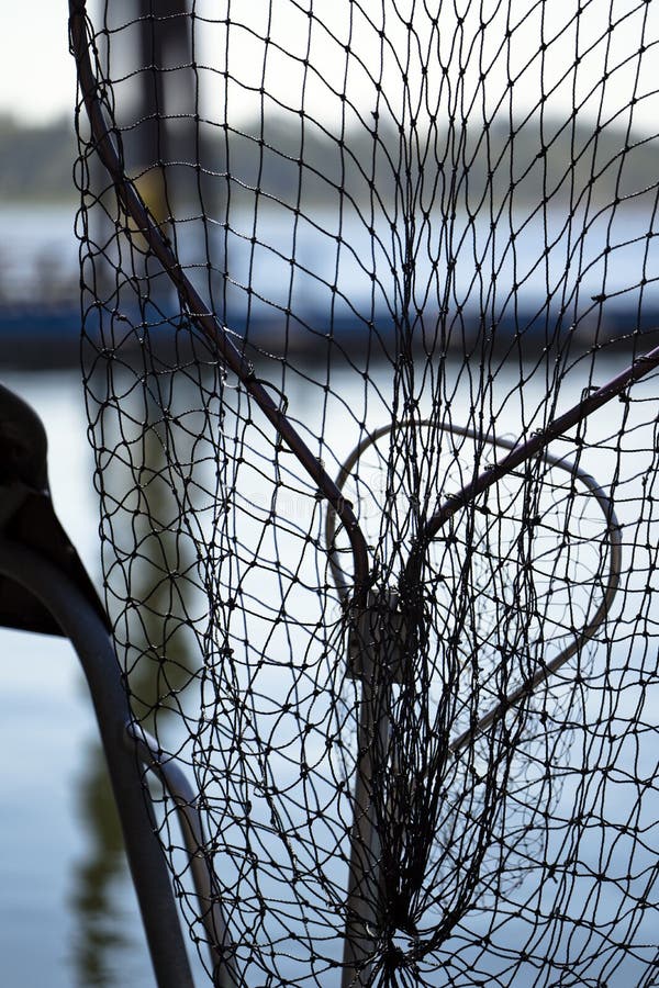 Big and Small Fishing Nets for Hooking Fish Stock Image - Image of ...