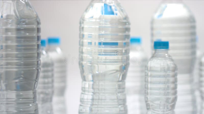 Big and Small Plastic Bottles of Mineral Water Stock Footage - Video of ...