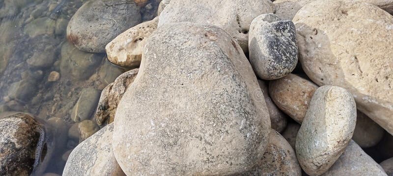 Big and Small Rocks by the River Stock Photo - Image of rock, river ...