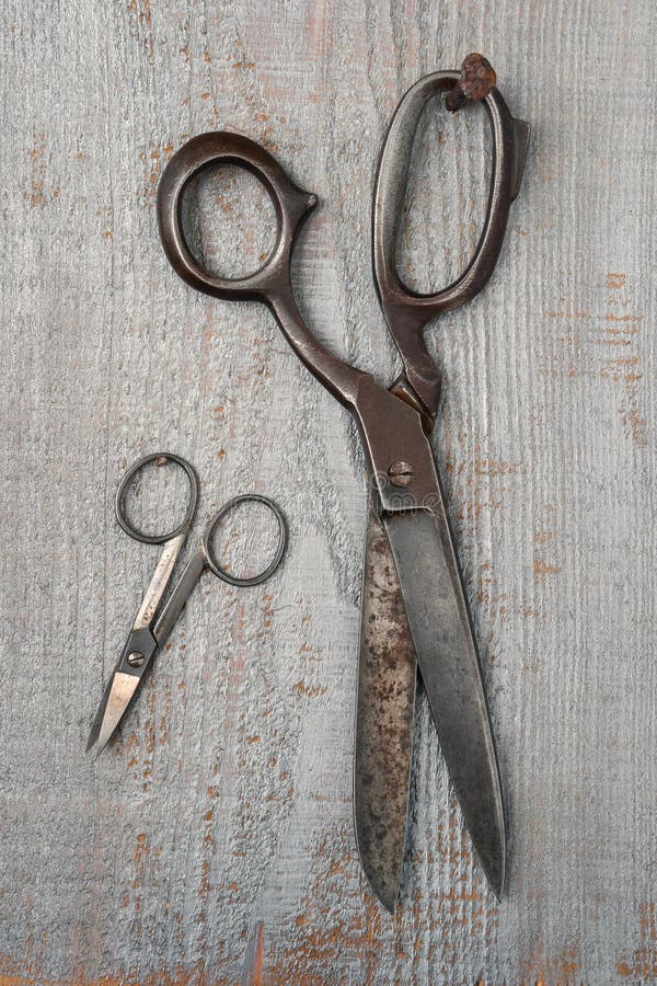 Big and small scissors stock image. Image of scissors - 54302287