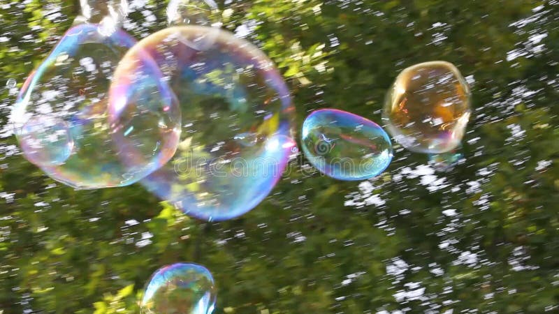Soap Bubbles Floating in the Air. Close-up. Slow Motion. Radiant Big ...