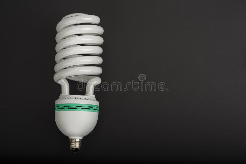 Big Spiral CLF Bulb on a Black Stock Photo - Image of energy ...