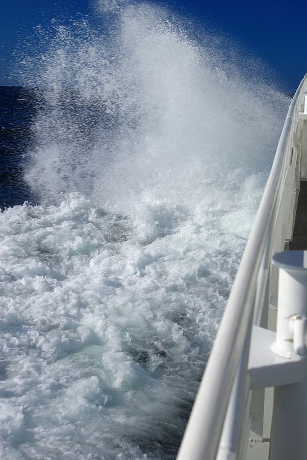 Splashing the boat stock photo. Image of power, boat, couple - 61518