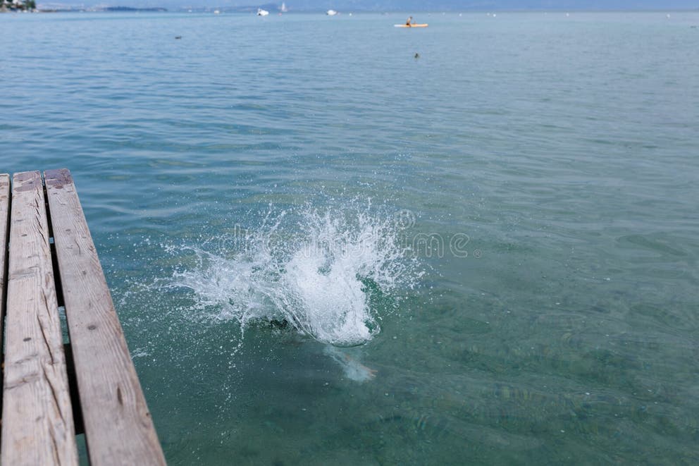 Big Splashes on the Water after the Jump Stock Image - Image of swim ...