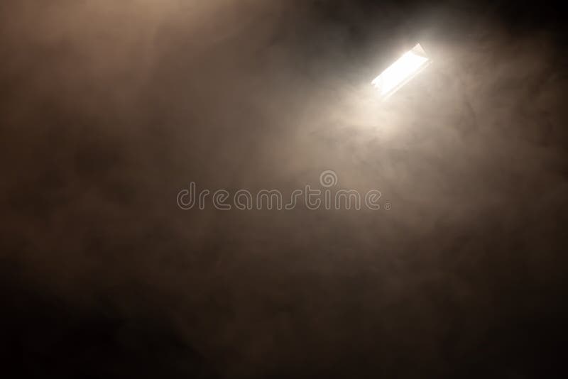 Big Spotlight Shining in Room Full of Smoke Stock Image - Image of ...