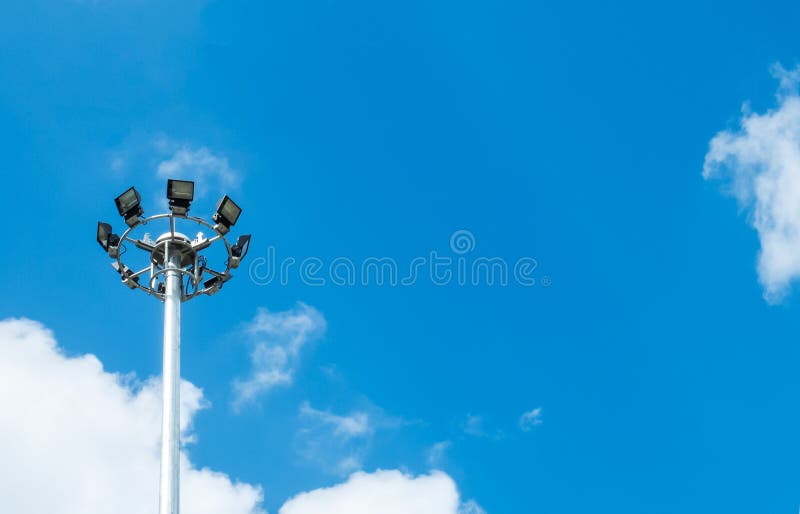 Spotlight Tower Against Blue Sky. Street Lamp. Modern Light Pole. Stock ...