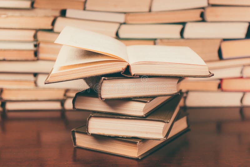 Big Stack of Books on the Wooden Table Stock Photo - Image of group ...