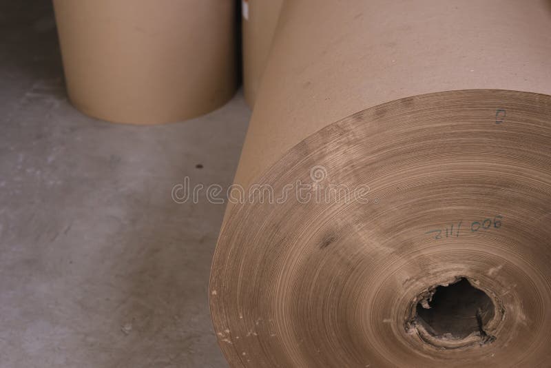 Big Stack of Printing Paper Rolls in Warehouse. the Concept of ...