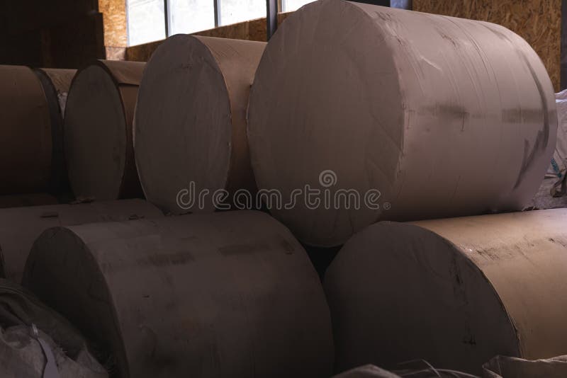 Big Stack of Printing Paper Rolls in Warehouse. the Concept of ...