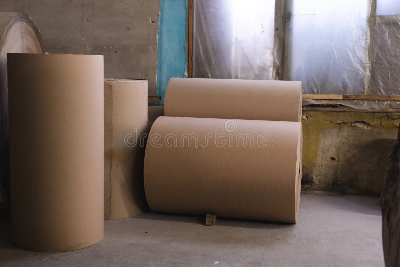Big Stack of Printing Paper Rolls in Warehouse. the Concept of ...