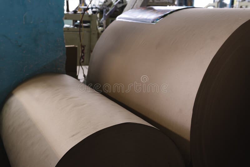 Big Stack of Printing Paper Rolls in Warehouse. the Concept of ...