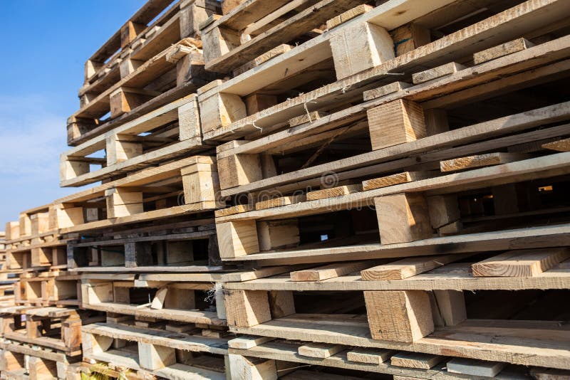 The Big Stack of Wooden Cargo Pallets Stock Image - Image of pallet ...