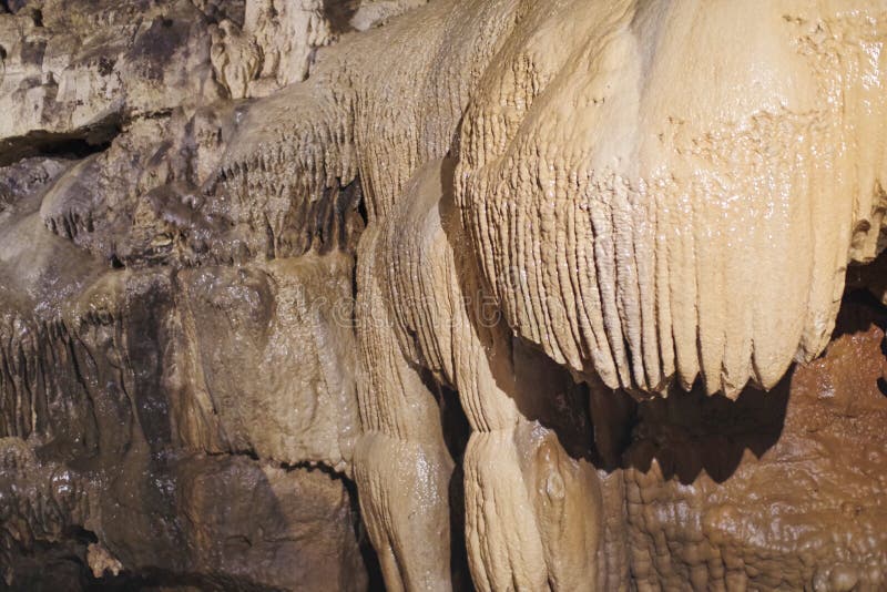 A Big Stalactite is Hanging from the Rock Stock Image - Image of frost ...