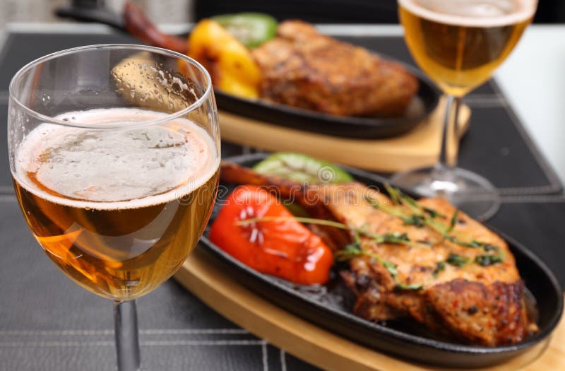 Big steak and beer glass stock image. Image of blood - 96834167