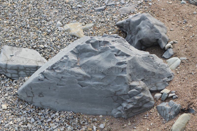 Big Stone on the Sea among the Pebbles. Stock Image - Image of pebbles ...