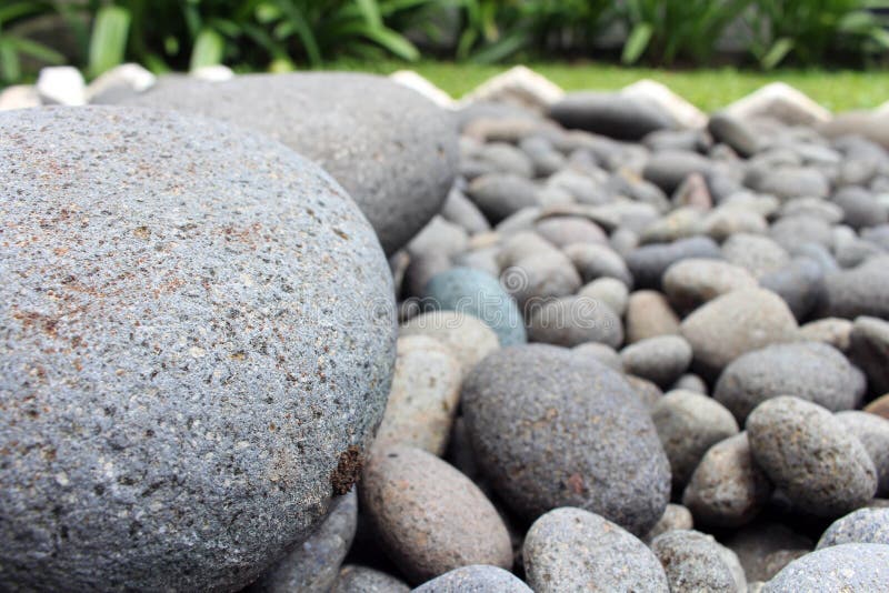 Big Stones among Smaller Pebbles, in the Garden Stock Photo - Image of ...