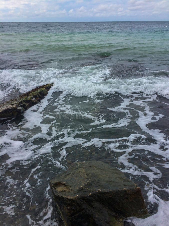 Stones Washed Ashore on Sand Beach Rock Background Stock Image - Image ...