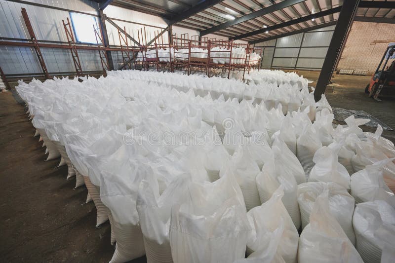 Big Storage with White Plastic Sacks Stock Image - Image of product ...