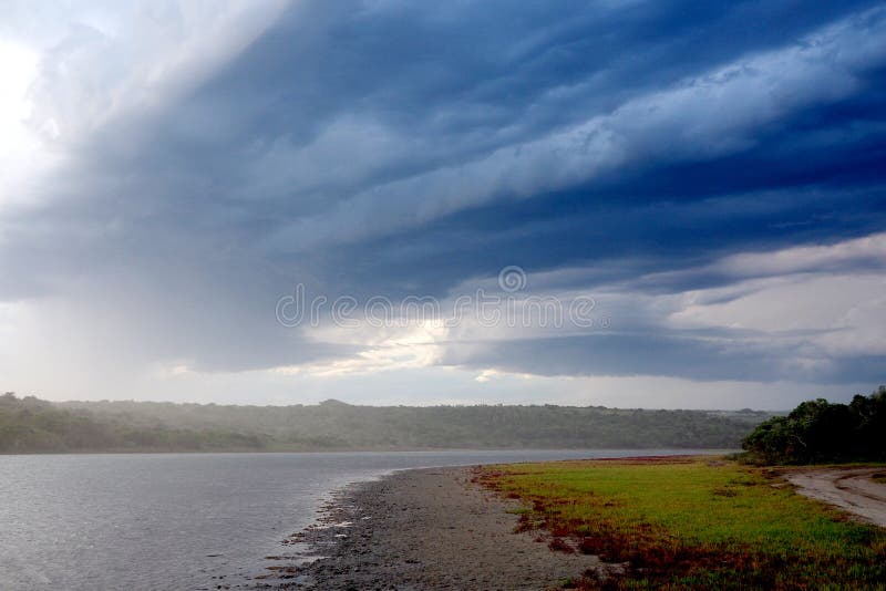 Big Storm Clouds Over a River Stock Photo - Image of cloud, dramatic ...