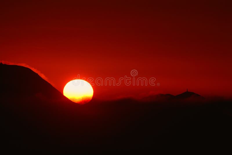 Big Sun in a Fiery Red Sunset on an Island Stock Photo - Image of ...