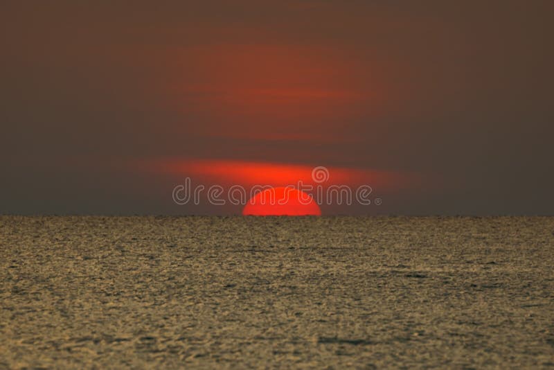 Big Sun Setting Down Over the Sea Stock Image - Image of june, heat ...