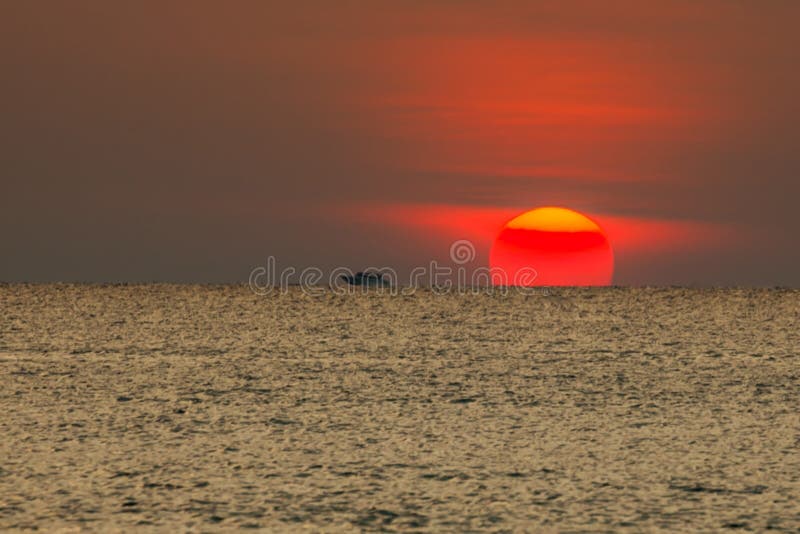 Big Sun Setting Down Over the Sea Stock Photo - Image of scarlet ...