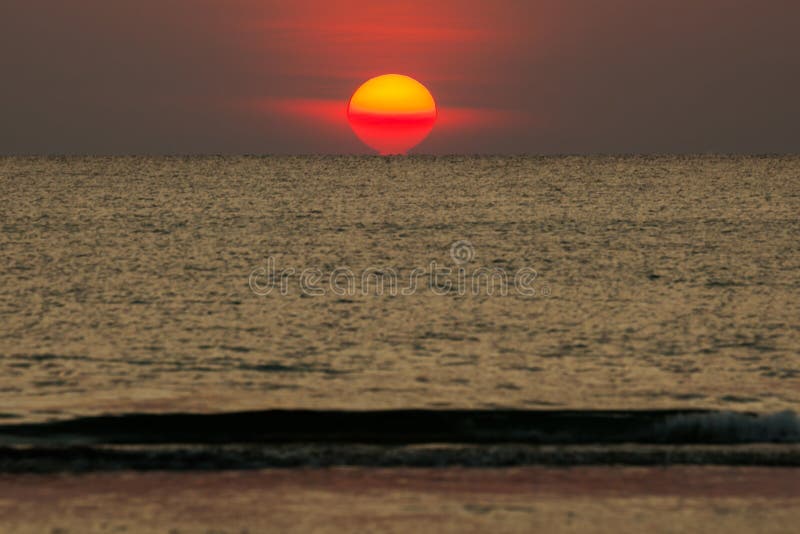 Big Sun Setting Down Over the Sea Stock Image - Image of disc, blue ...