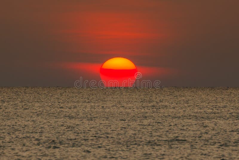 Big Sun Setting Down Over the Sea Stock Photo - Image of indian, orange ...