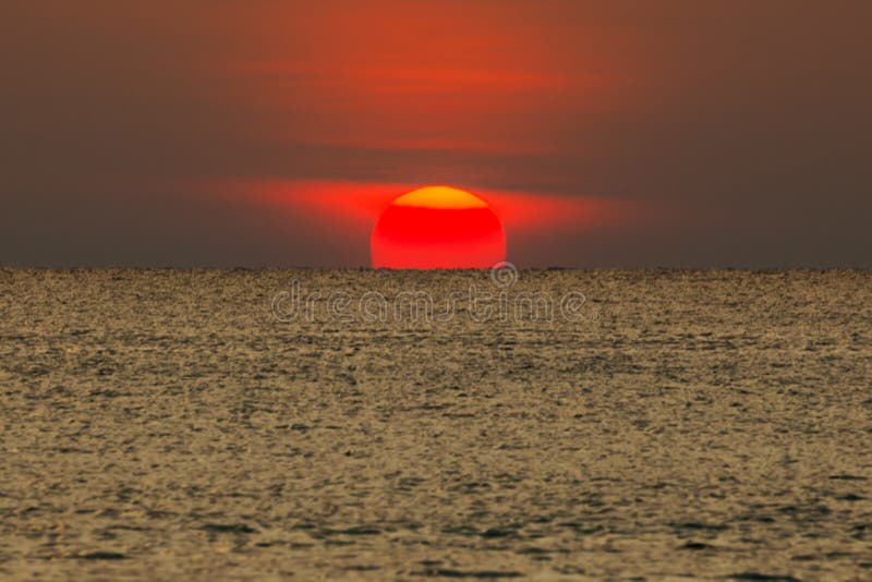 Big Sun Setting Down Over the Sea Stock Image - Image of happiness ...