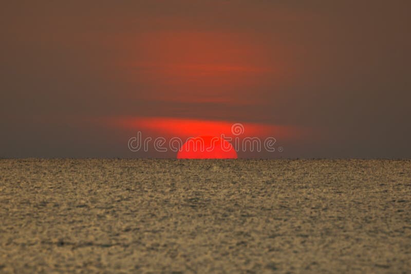 Big Sun Setting Down Over the Sea Stock Image - Image of june, horizon ...