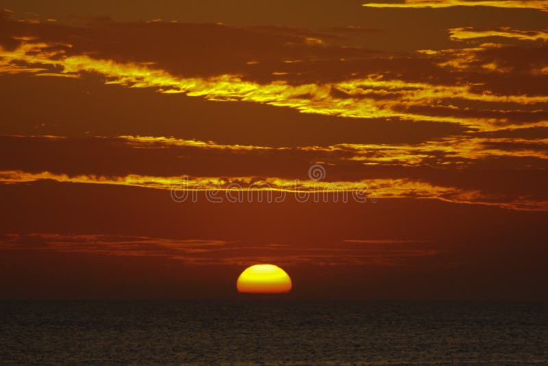 Big sun stock image. Image of clouds, sunset, color - 139880081