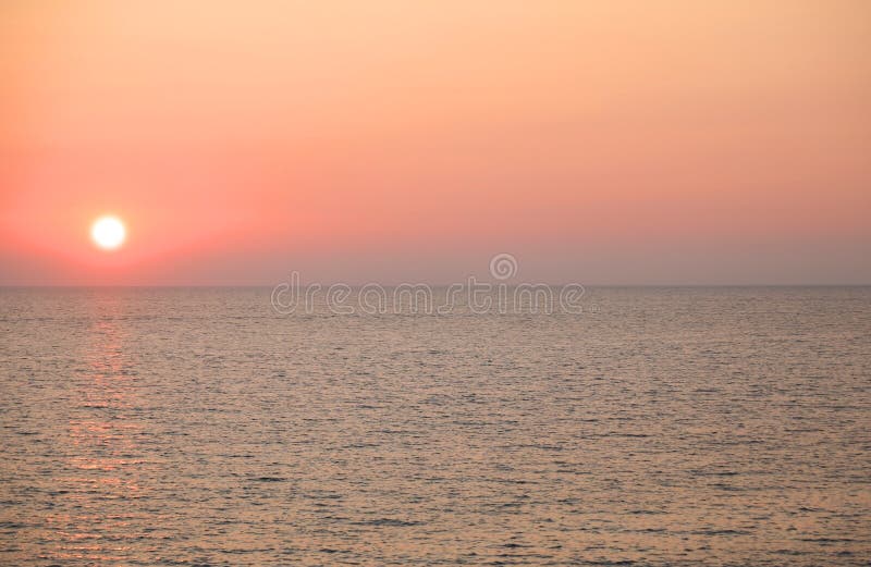Big Sun and Warm Colors Over the Water Stock Photo - Image of tones ...