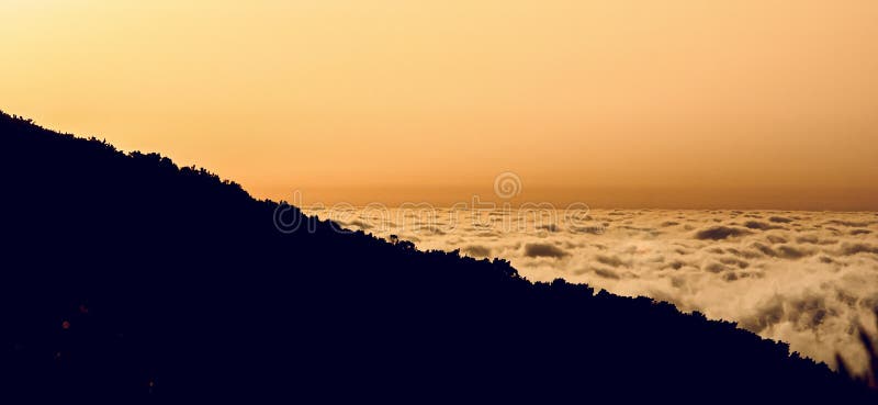 Big Sunrise from the Mountain Above the Clouds Stock Photo - Image of ...