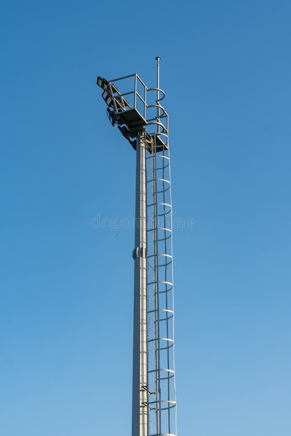 Big and Tall Stadium Spot Light Against Blue Sky Stock Photo - Image of ...
