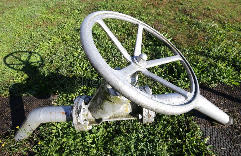 Big Tap with the Shutoff Valve of the Pipe in a Huge Industrial Stock ...