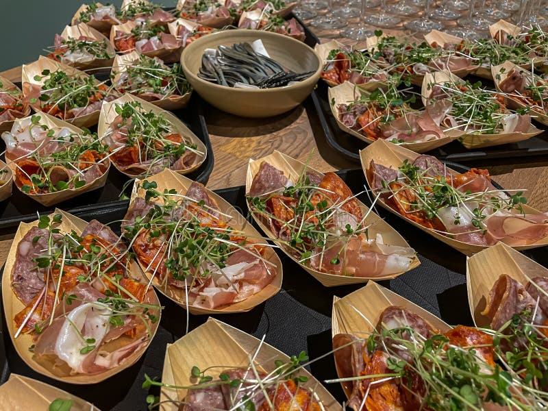 Tapas Serving of Pork, Served on Bamboo Boats, Garnished with Sprouts ...