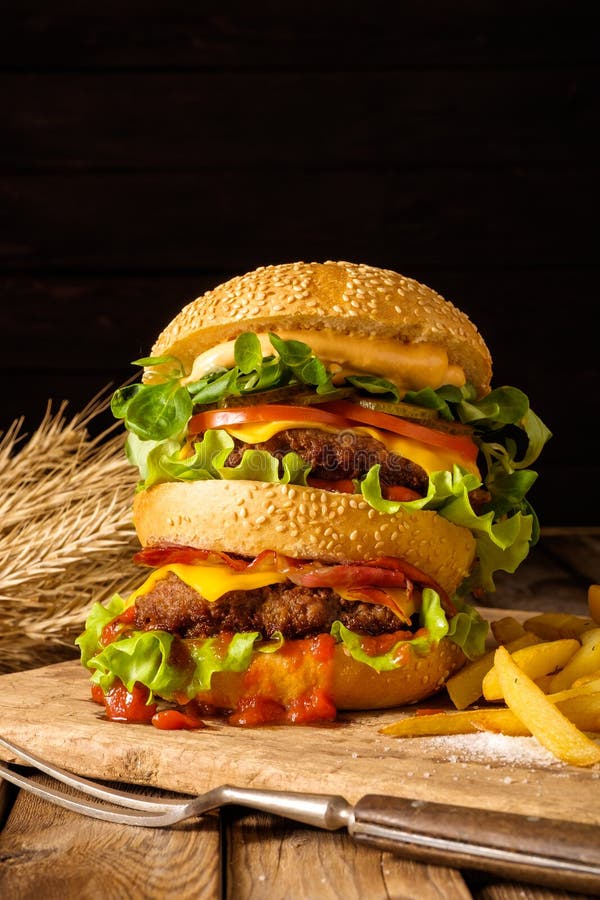 Tasty Burger with Beef, Bacon, Fried Egg and Mushrooms Stock Image ...