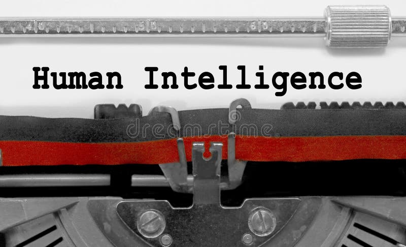 Big Text Human Intelligence by the Old Typewriter on White Paper Sheet ...