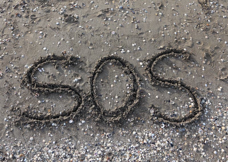 SOS sign in sand stock image. Image of writing, sand - 60115893