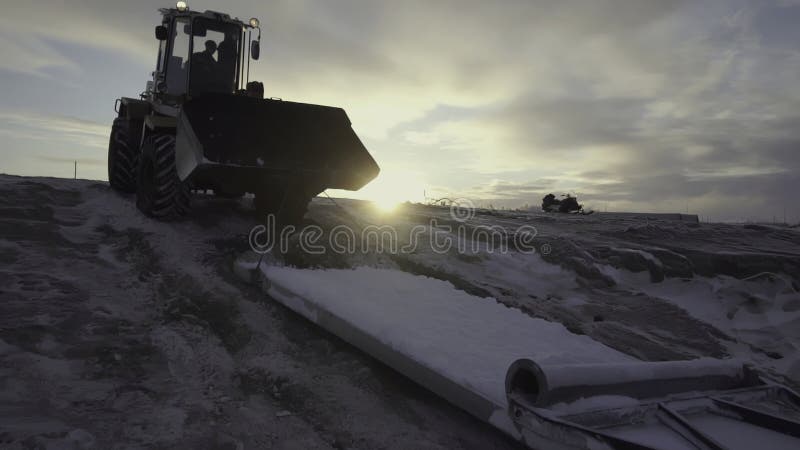 Big Tractor at the North Pole. CLIP. in the Foreground, a Tractor is ...