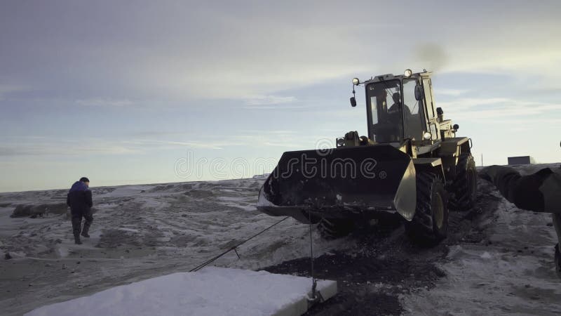 Big Tractor at the North Pole. CLIP. in the Foreground, a Tractor is ...