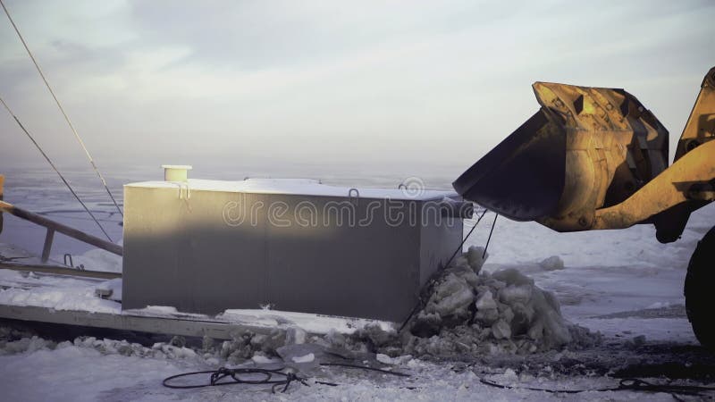 Big Tractor at the North Pole. CLIP. in the Foreground, a Tractor is ...