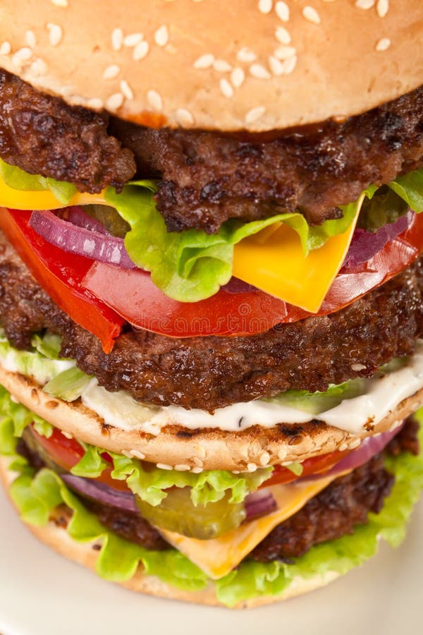 Big Triple Cheeseburger stock photo. Image of junkfood - 38308120