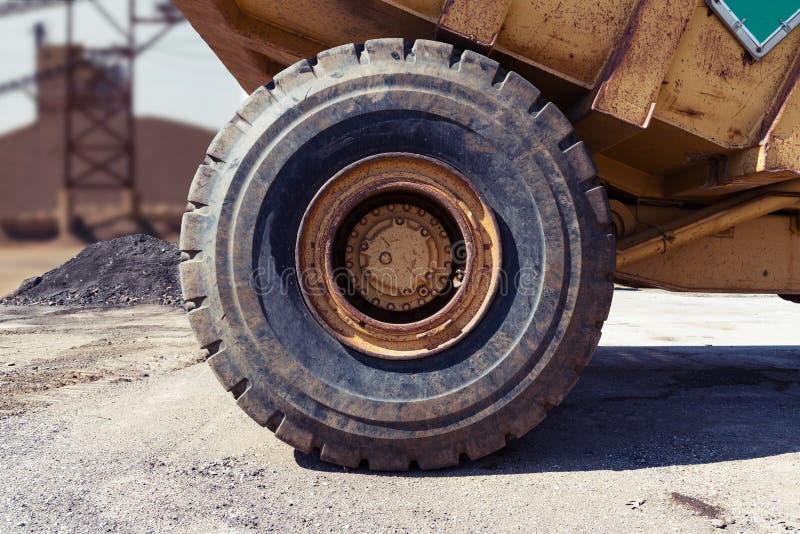 Mining Truck And Large Tire Stock Photo - Image of aged, classic: 24031434