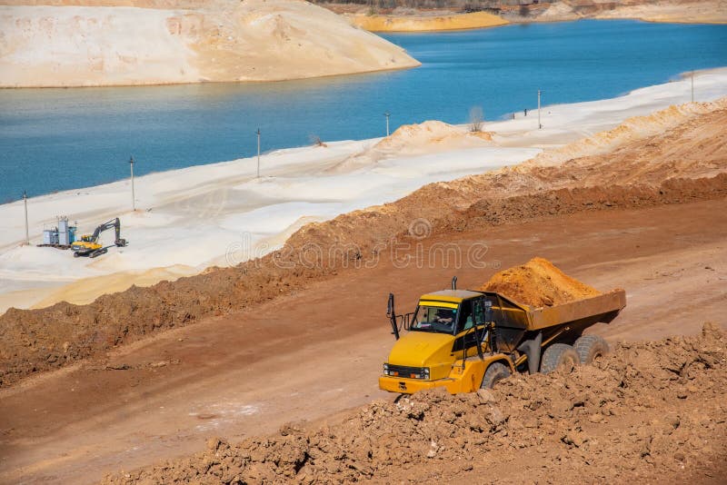 Big Truck Works at Sand Quarry Editorial Photo - Image of lake ...