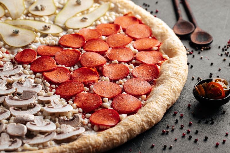 Big Uncooked Pizza with Variety of Toppings Stock Image - Image of ...