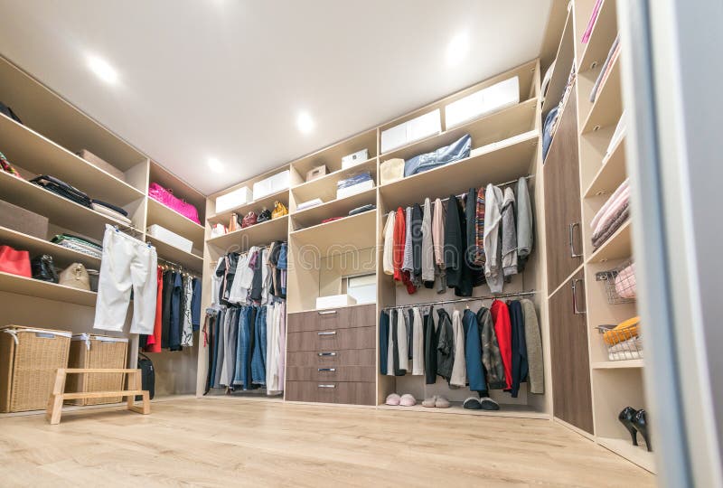 Big Wardrobe with Different Clothes for Dressing Room Stock Image ...